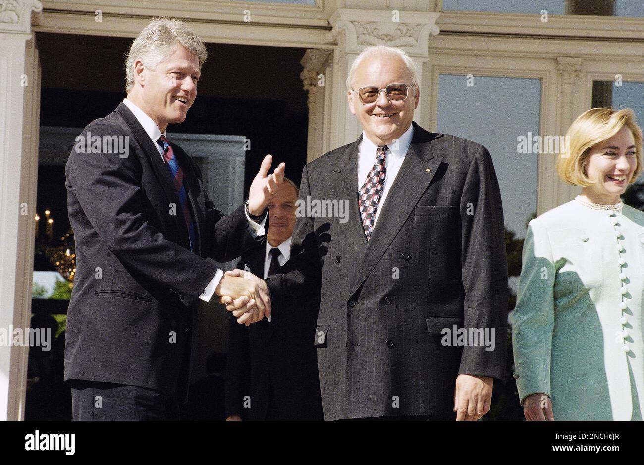 Communication authority smiling standing looking away gesturing hi-res ...