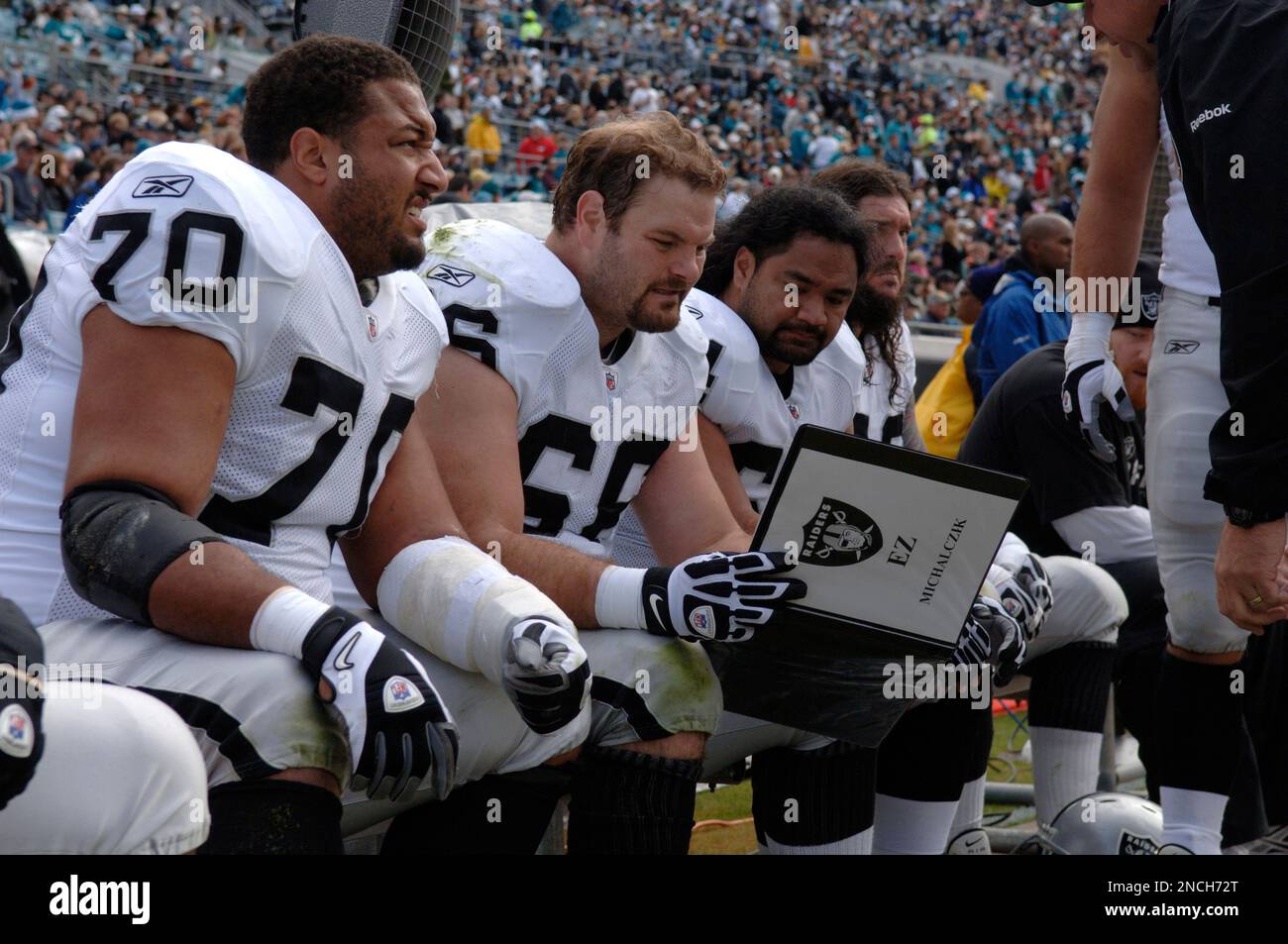 The Oakland Raiders offensive linemen Langston Walker (70), Cooper ...