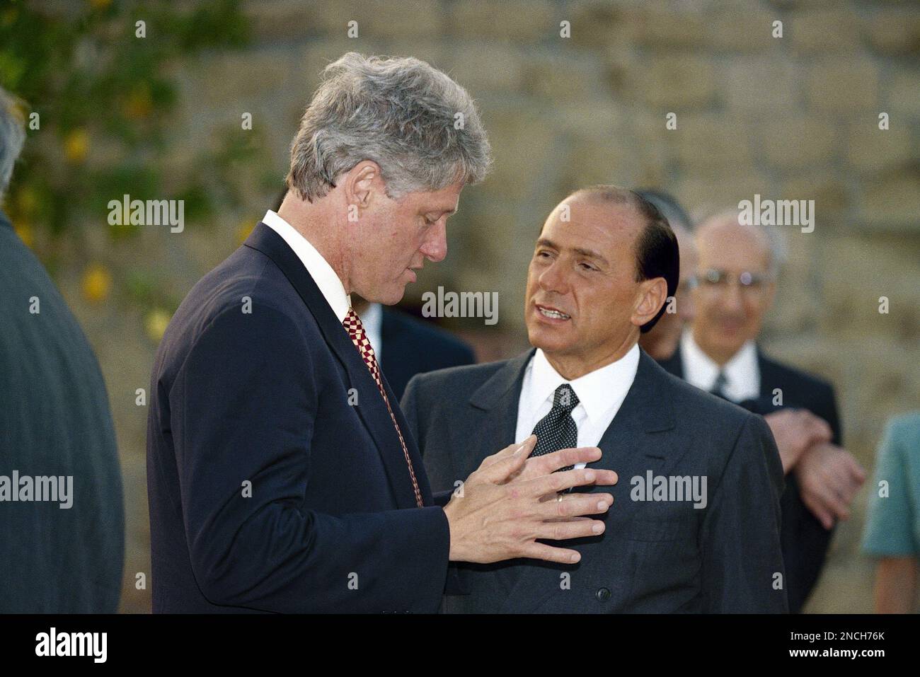 President Bill Clinton has a chat with Italian Premier Silvio ...