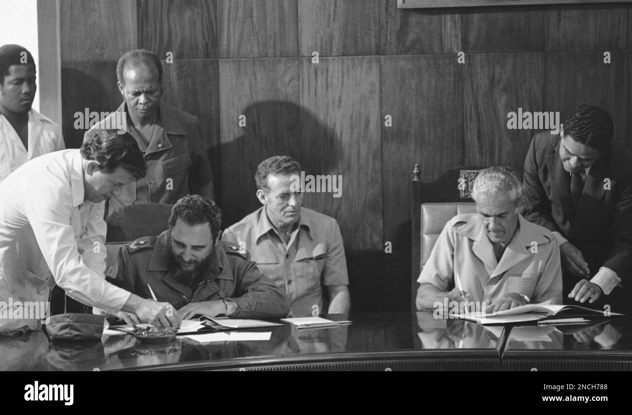 Cuban President Fidel Castro, left, and Jamaican Prime Minister Michael ...