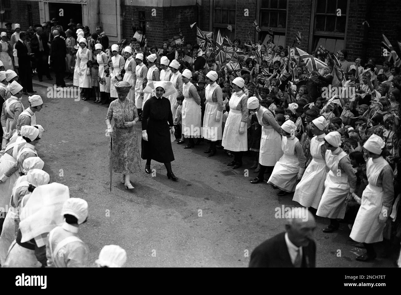 Britain's Queen Mary with the matron inspecting the nurses at the Queen ...