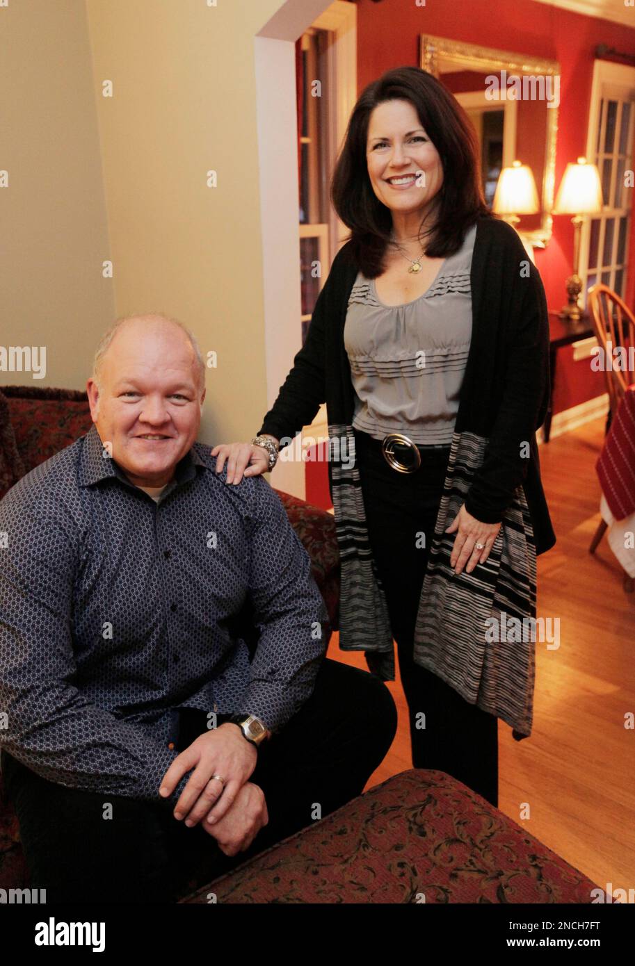 In this photo taken, Dec. 6, 2010, Andrew Craig, and his wife Kelly ...