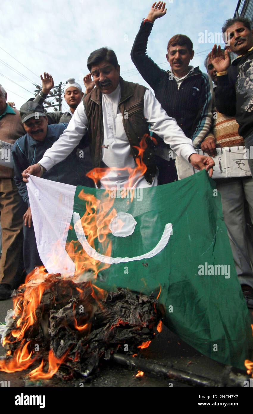 Protestors burn a Pakistan flag during a protest on the anniversary of ...