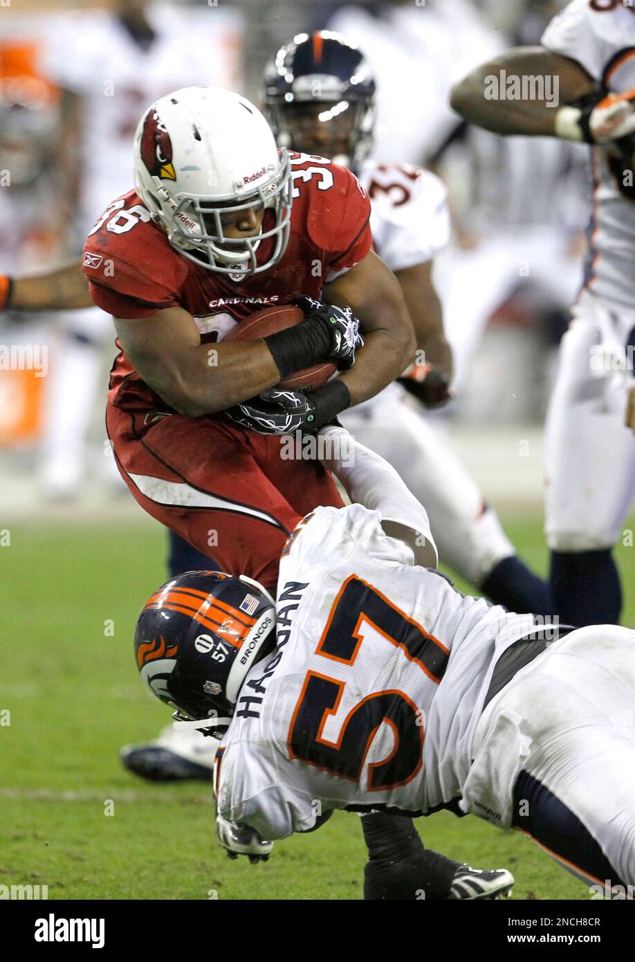 Denver Broncos' Mario Haggan (57) tackles Arizona Cardinals' LaRod ...