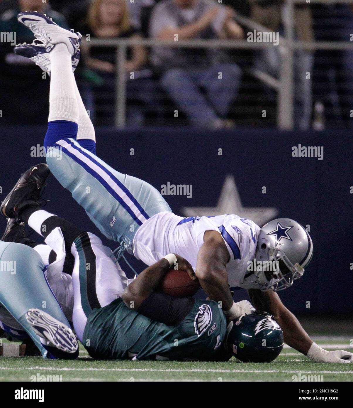 Dallas Cowboys linebacker Anthony Spencer (93) lands on top of ...