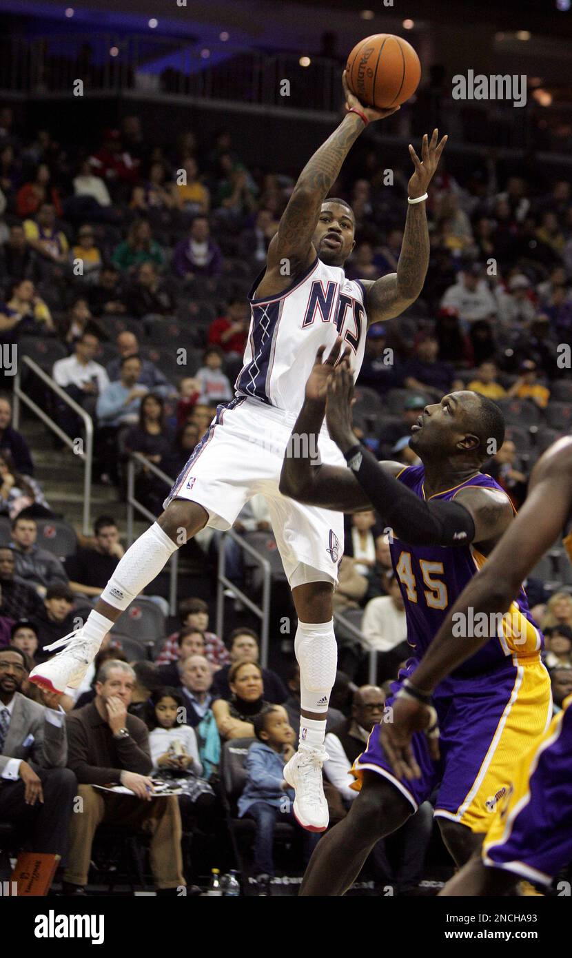 New Jersey Nets' Terrence Williams (1) takes a jump shot as Los Angeles ...