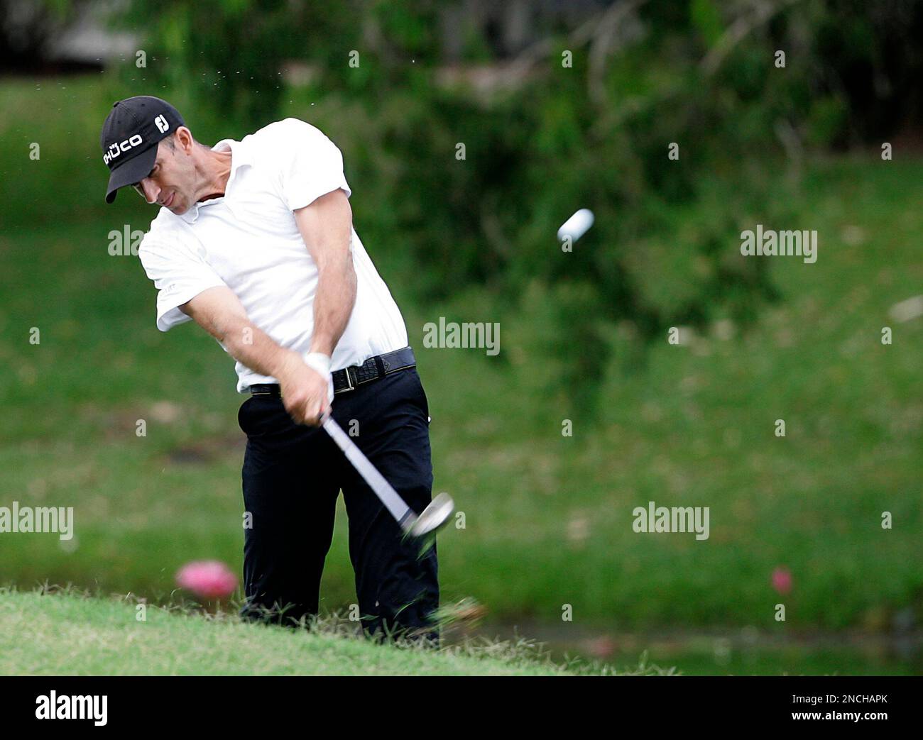 Australia's Geoff Ogilvy plays a shot on the 18th hole during the ...