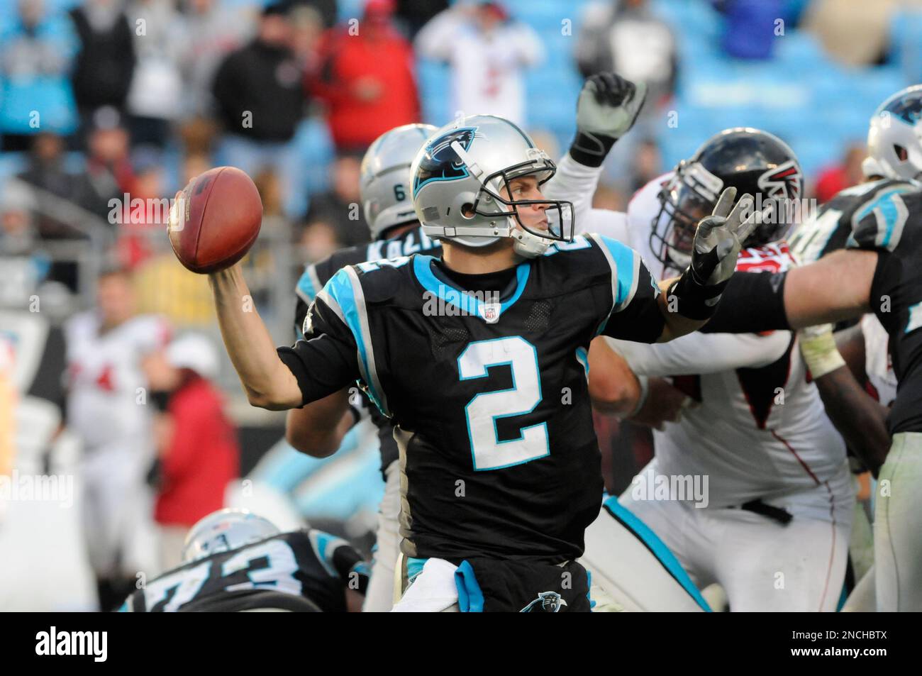 Carolina Panthers' Jimmy Clausen (2) passes the ball during an NFL ...