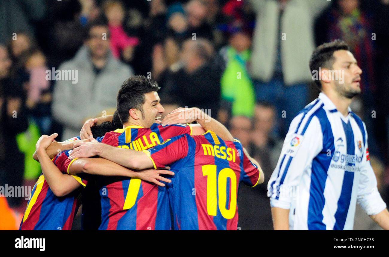 FC Barcelona's David Villa, center, reacts after scoring against Real ...