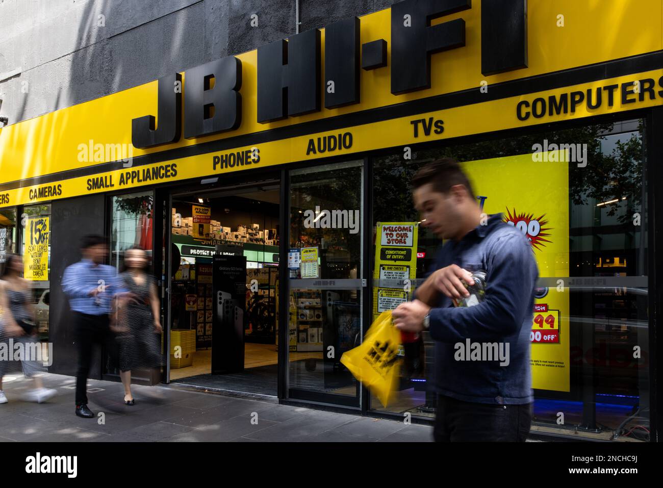 JB-HI’s signs are seen outside a store on Elizabeth Street in Melbourne, Wednesday, February 15 ...