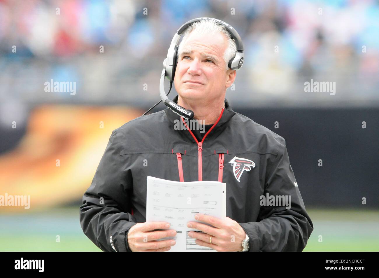 Atlanta Falcons head coach, Mike Smith watches a replay on the stadium ...