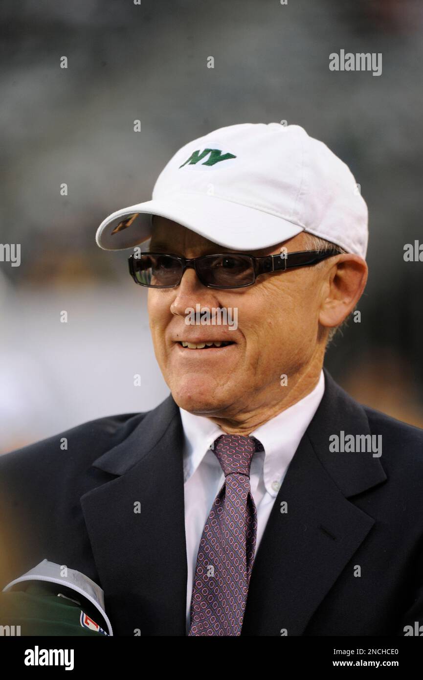 New York Jets owner Woody Johnson looks on before an NFL football game between the Miami ...