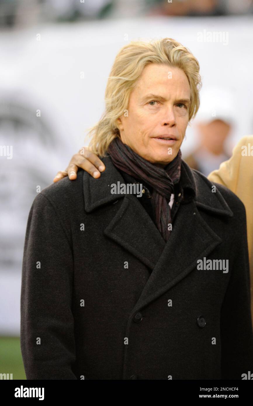Musical artist, Brian Ray, looks on before an NFL football game between ...