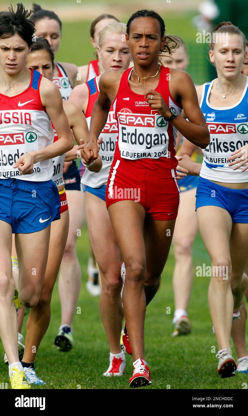 Turkey's Meryem Erdogan, center, runs on her way to win the Women Under ...