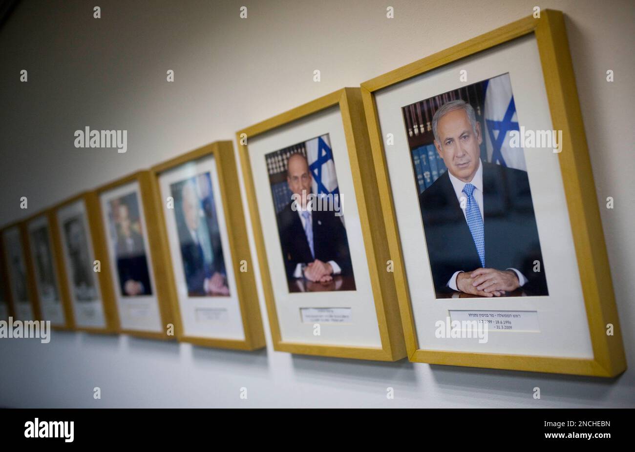 A portrait of Israeli Prime Minister Benjamin Natanyahu, right, and ...