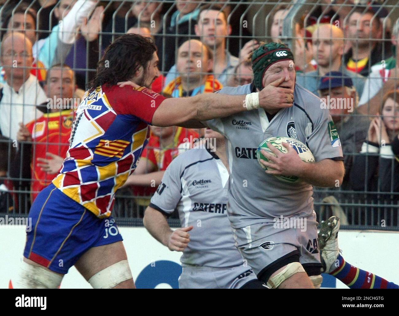 Perpignan's Jean-Pierre Perez, left, challenges Leicester Tigers ...