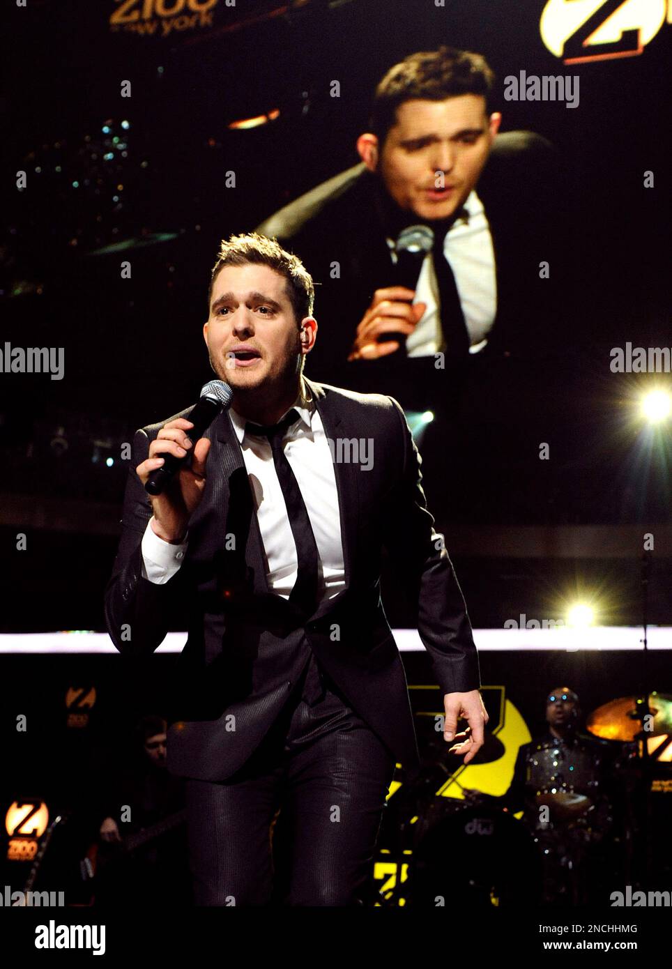 Singer Michael Buble performs at the 2010 Z100 Jingle Ball concert at ...