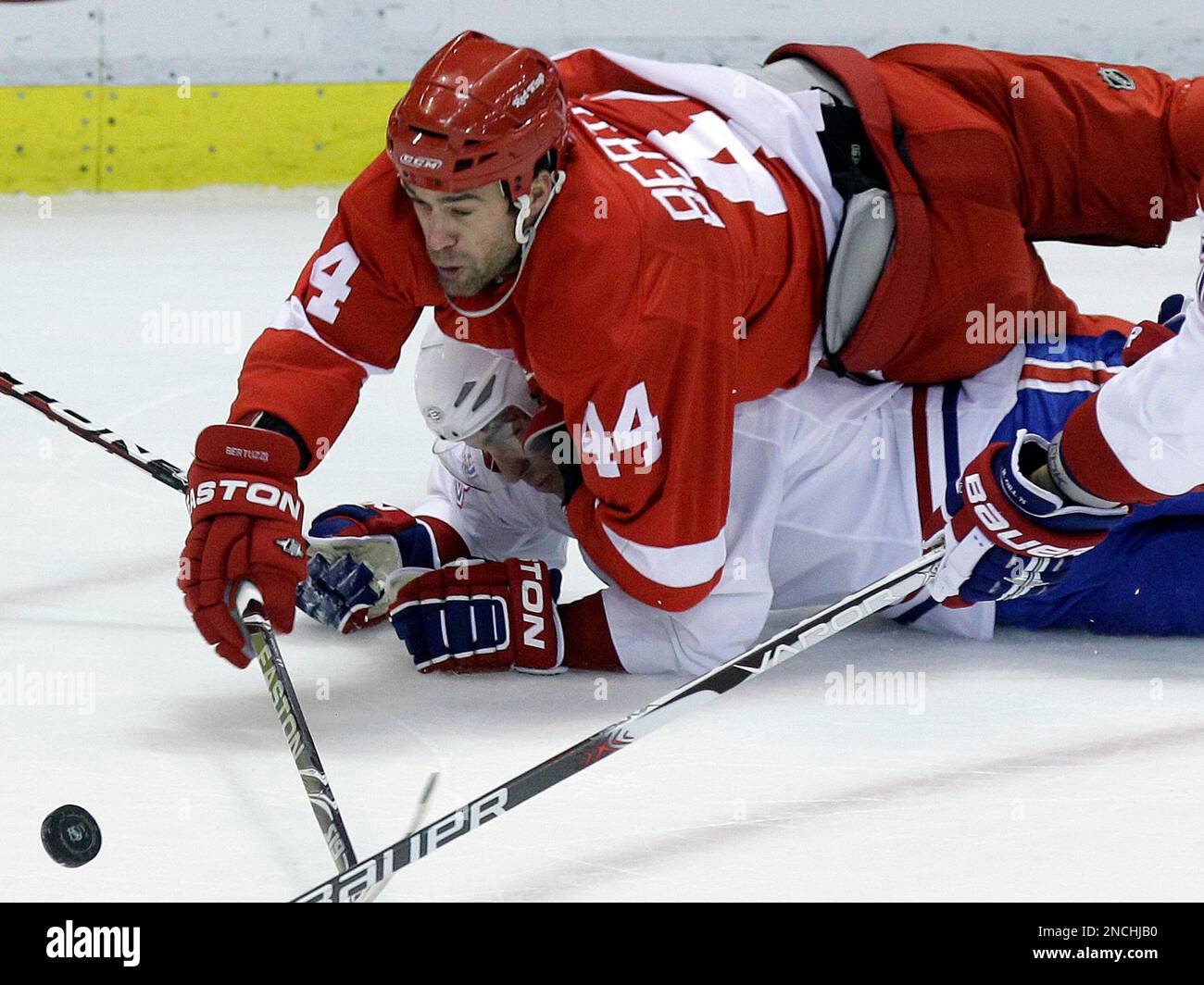 Detroit Red Wings winger Todd Bertuzzi (44) reaches for the puck over ...