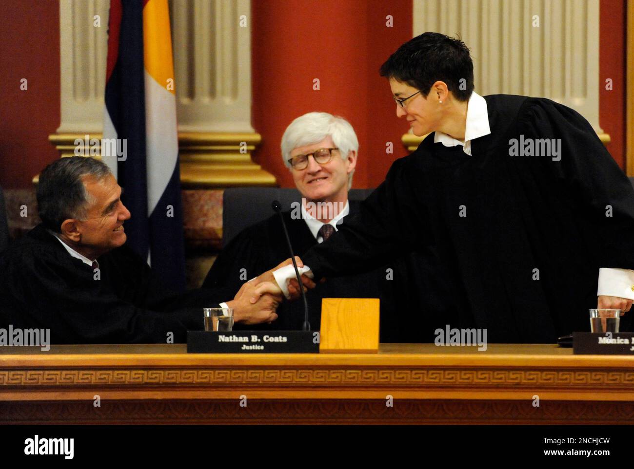Newly sworn in State supreme court justice Monica Marquez, right ...