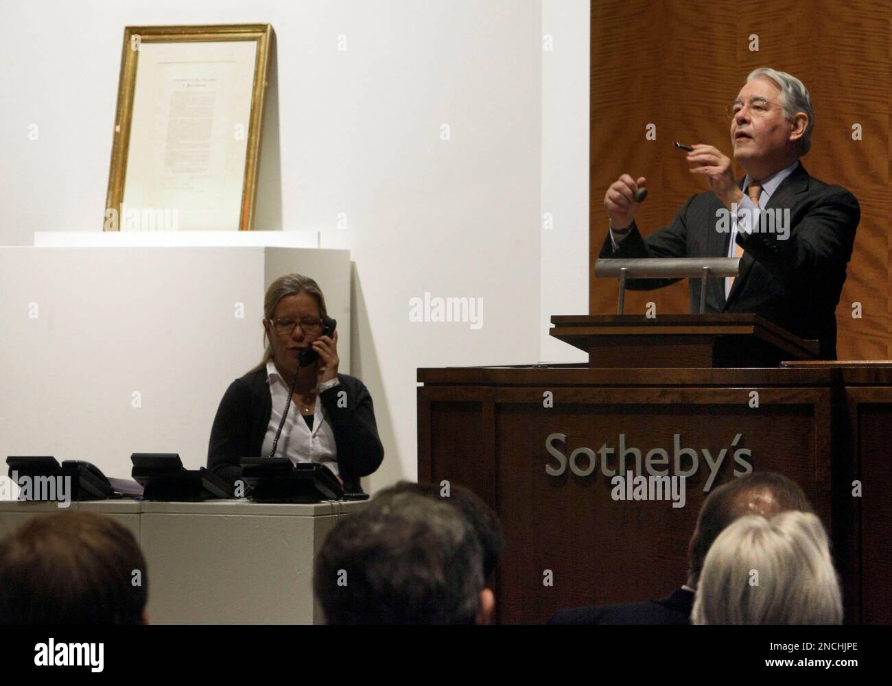Auctioneer David Redden conducts bidding for a copy of the Emancipation ...