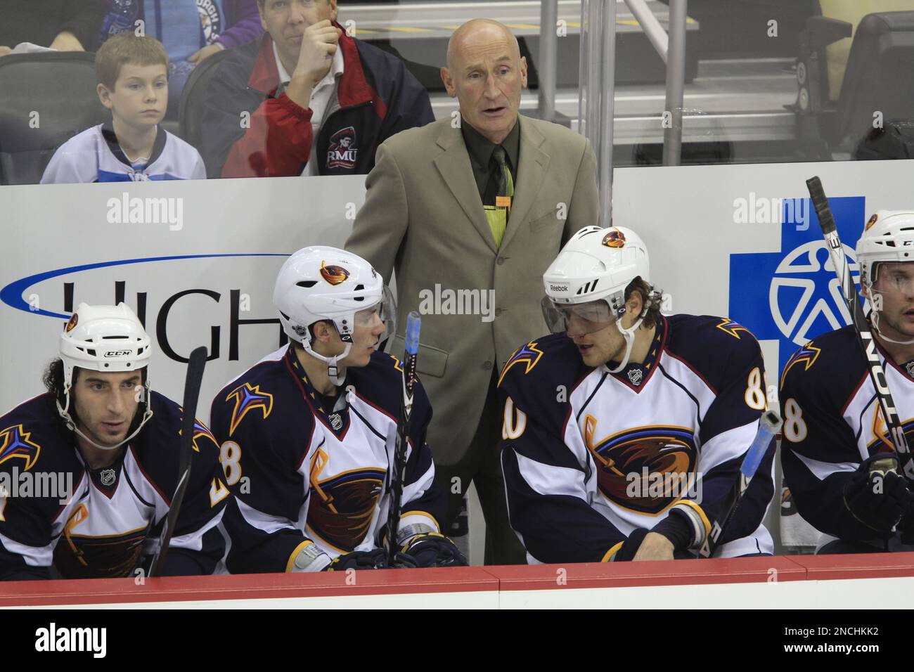 Atlanta Thrashers coach Craig Ramsay stands behind his bench during an ...