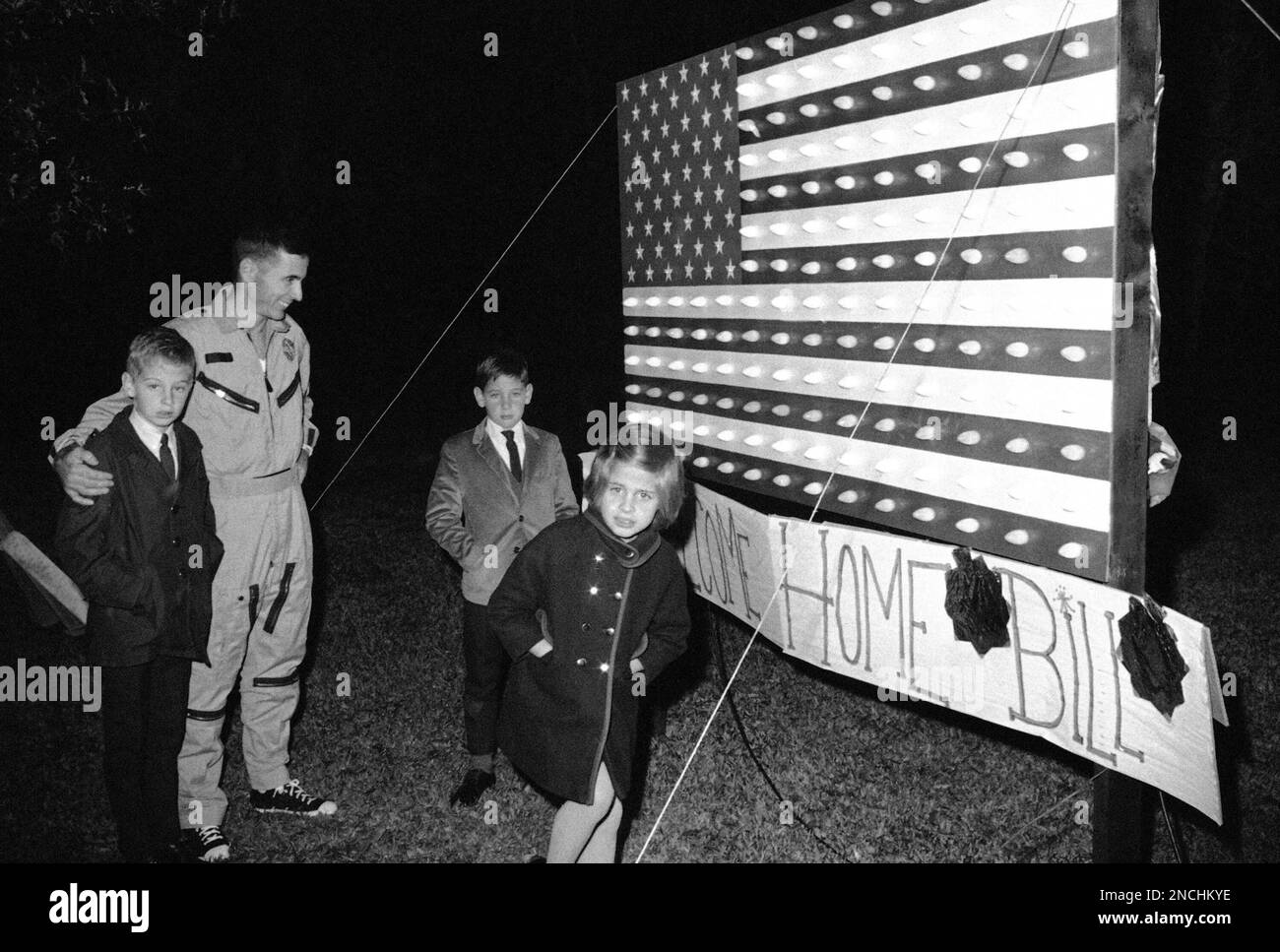Lt. Col. William A. Anders, Apollo 8 lunar module pilot, hugs son, Alan ...