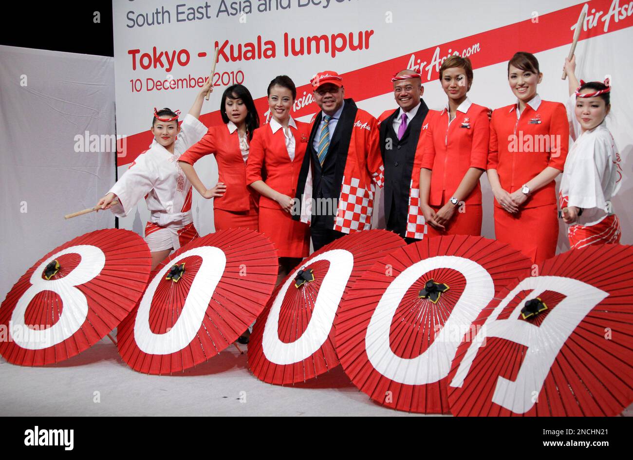 AirAsia X's CEO Azran Osman-Rani, fourth right, and Deputy CEO Dato ...