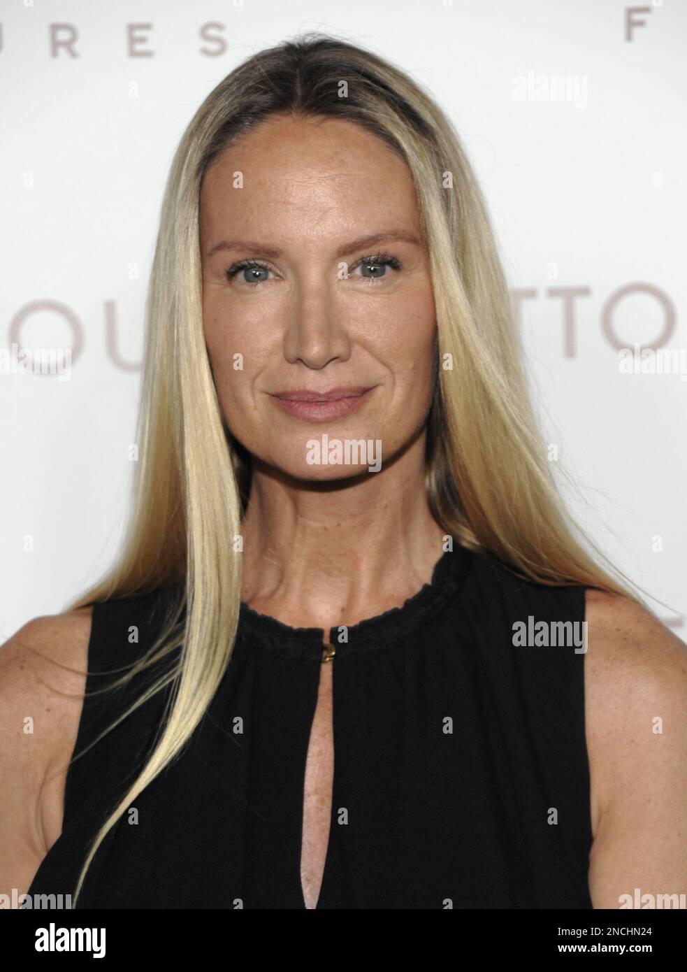 Actress Kelly Lynch arrives at the premiere of the feature film ...