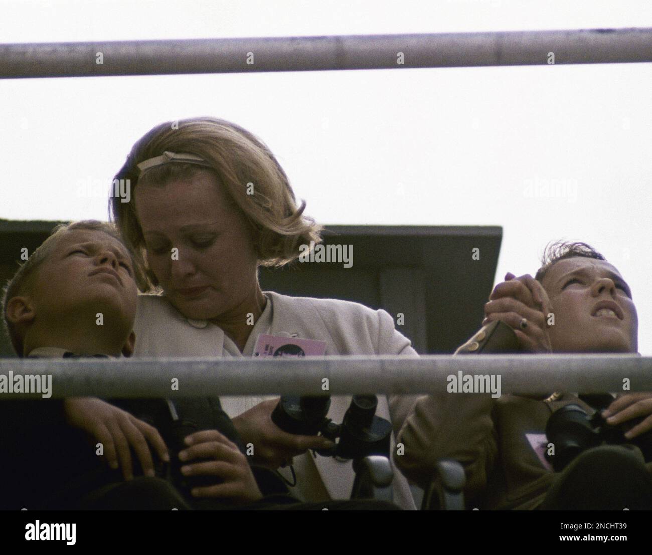 Wife of astronaut Frank Borman holds onto sons at launch of Gemini VII ...