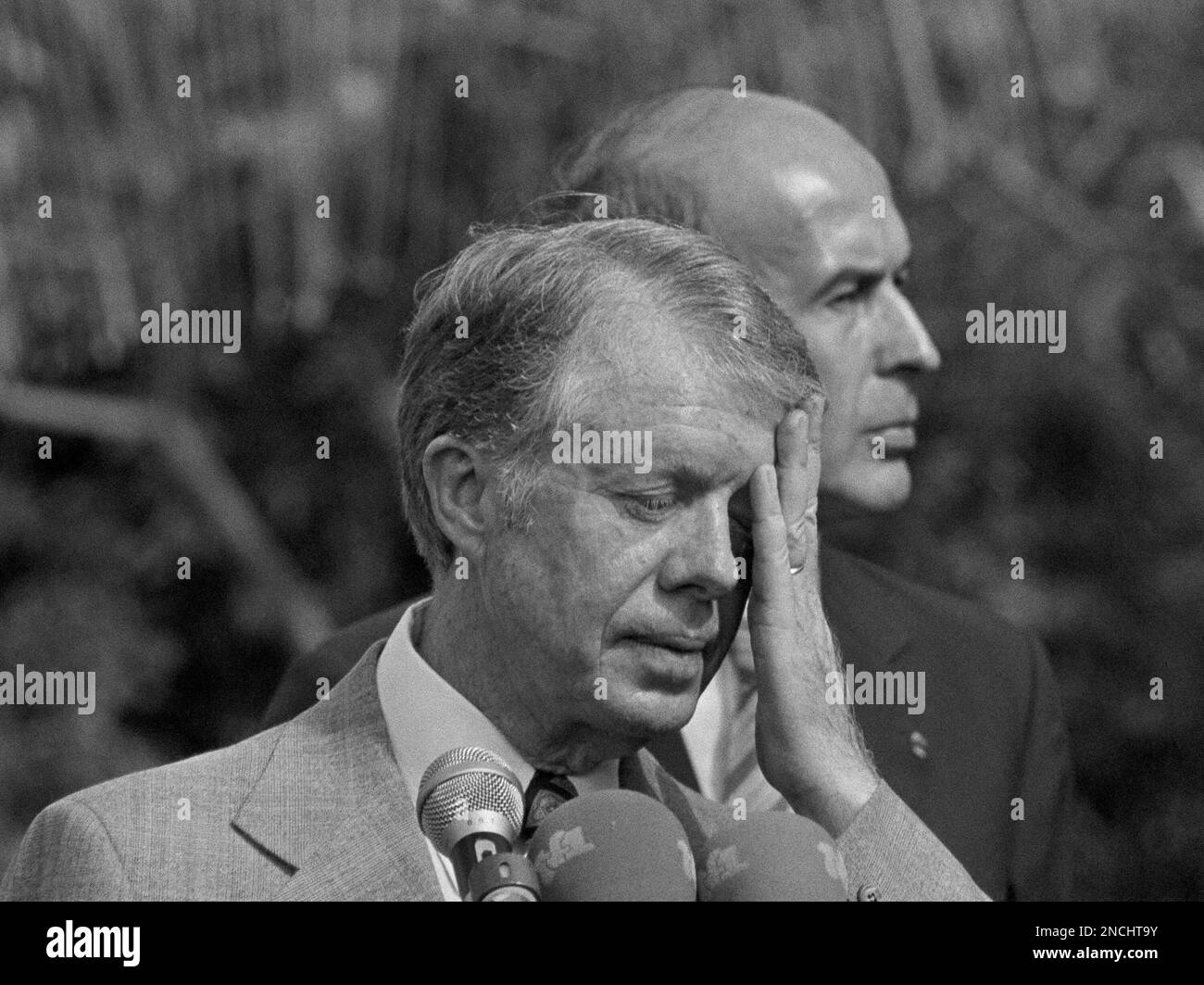 President Jimmy Carter gathers his thoughts before making a closing ...