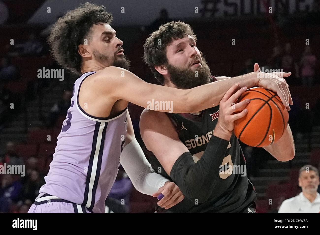 Kansas State forward Ismael Massoud, left, fouls Oklahoma forward ...