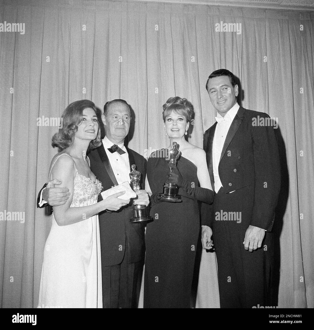 From left to right are Jean Simmons, Harry Stradling, Arlene Dahl, and ...