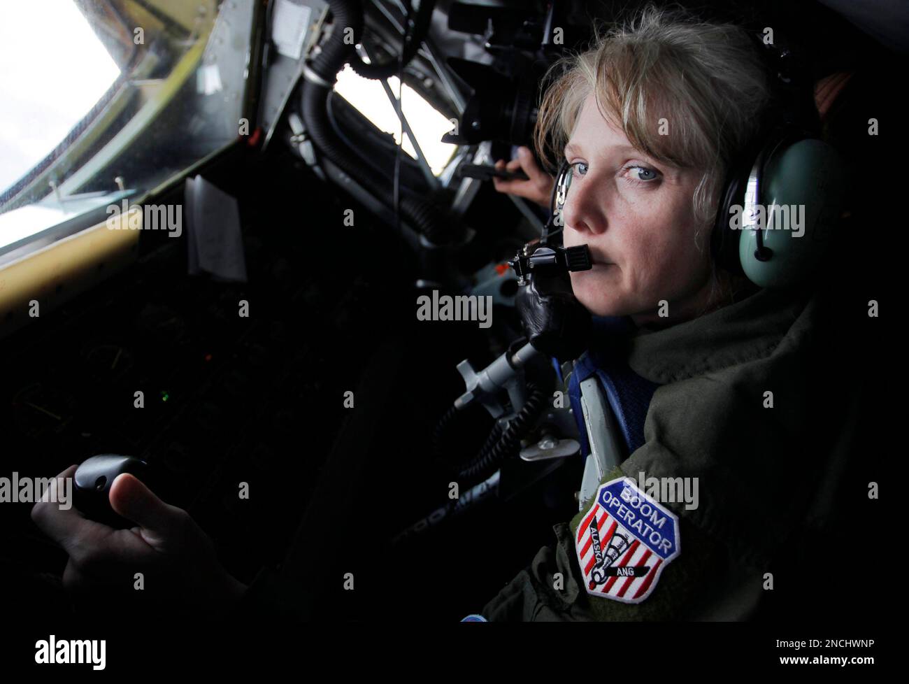 U.S. Air Foce air refueling tanker KC-135R's boom operator, M.Sgt ...