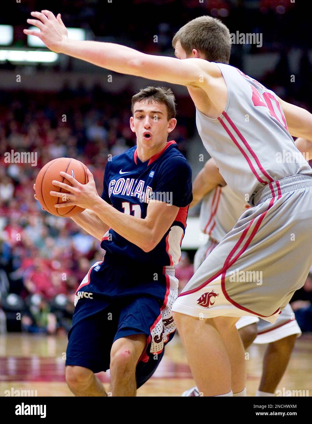 Gonzaga guard David Stockton, left, drives under Washington State ...