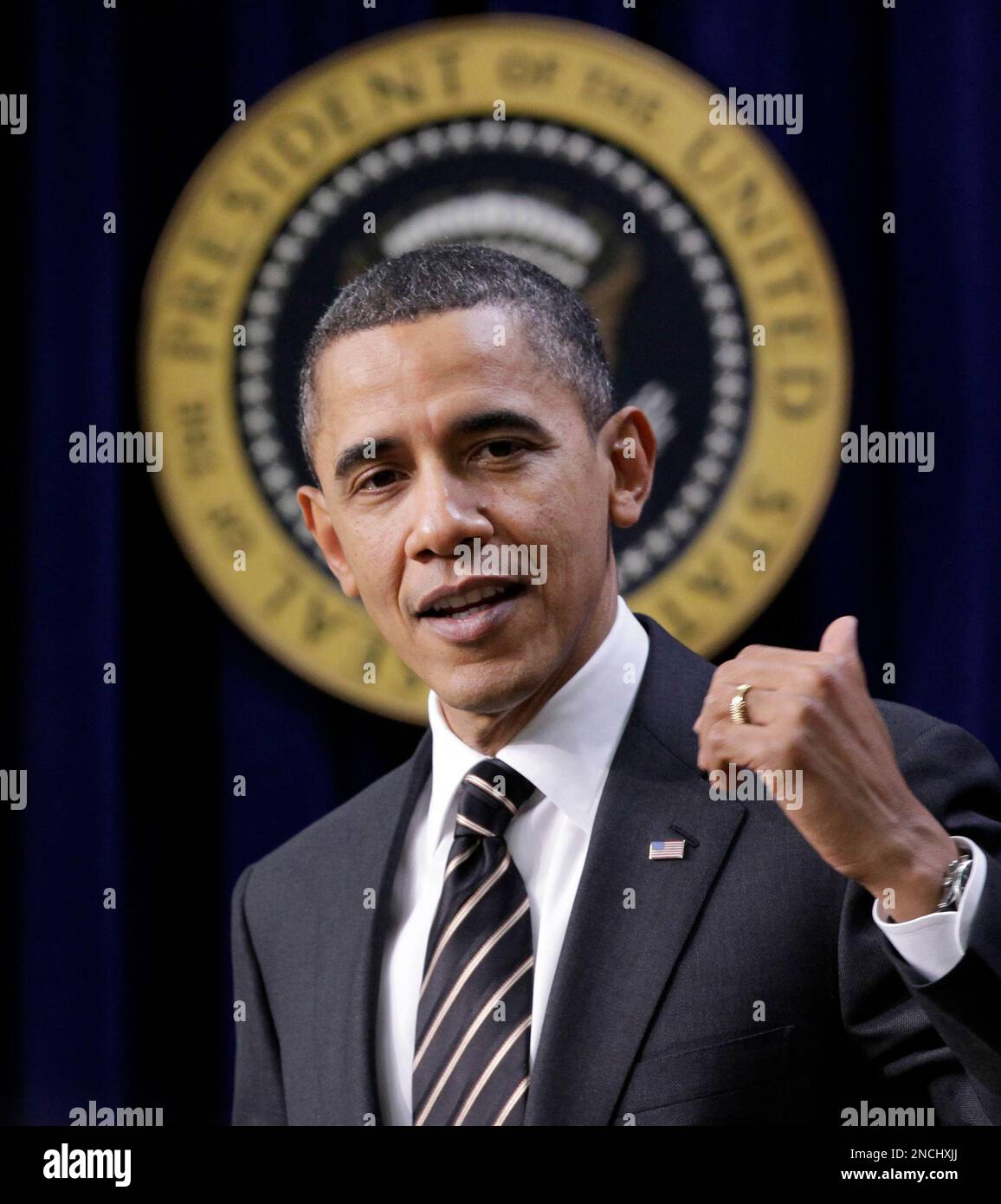 President Barack Obama speaks before he signs the Claims Resolution Act ...