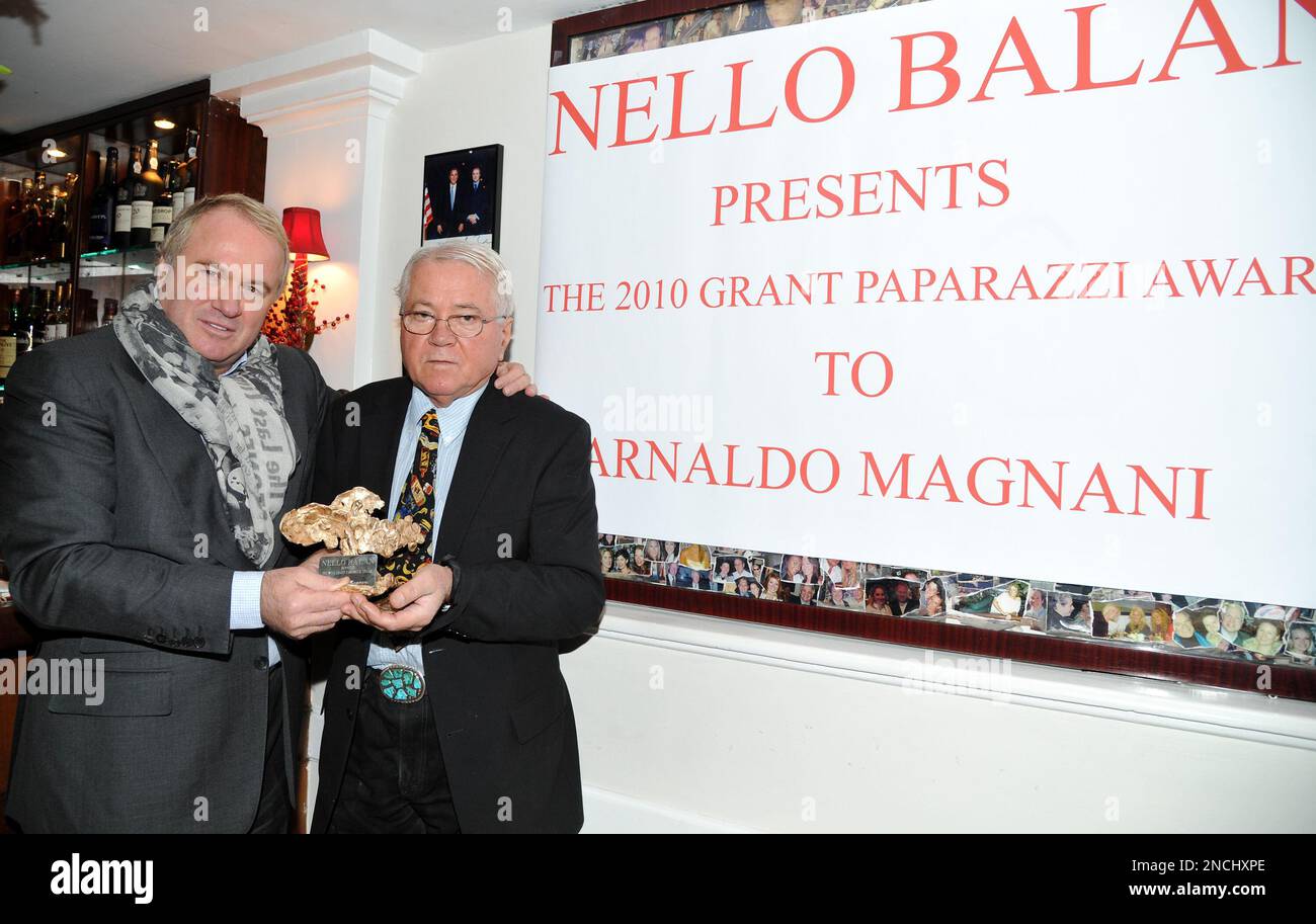 Celebrity photographer Arnaldo Magnani, right, receives the 2010 ...