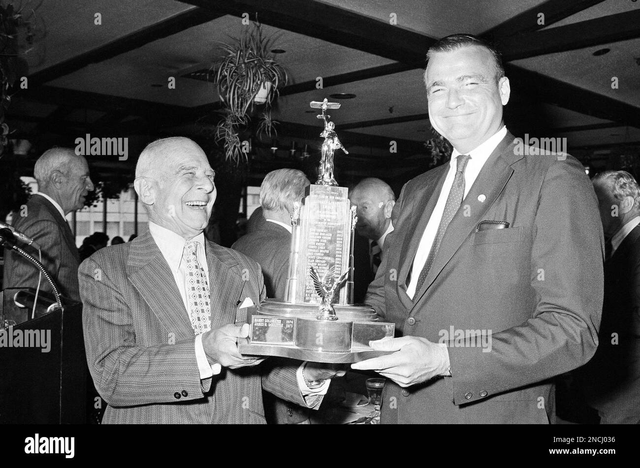 Gen. James H. Doolittle holds the Godfrey L. Cabot Trophy awarded him ...