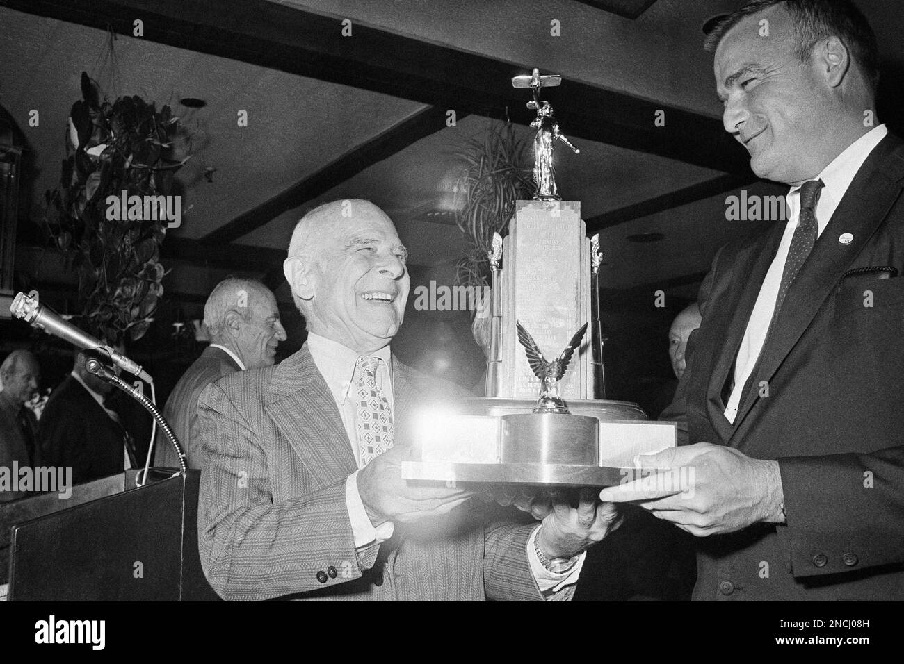 Gen. James H. Doolittle holds the Godfrey L. Cabot Trophy awarded him ...