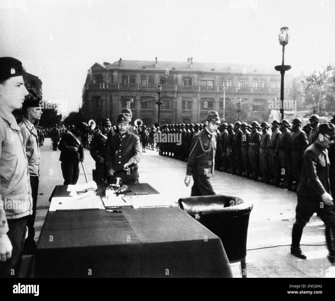 As a climax to the surrender of Japanese force, Japanese warriors ...