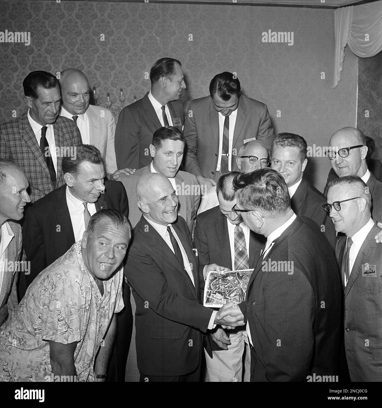 Lt. Gen. James H. Doolittle (center foreground, holding picture) is ...
