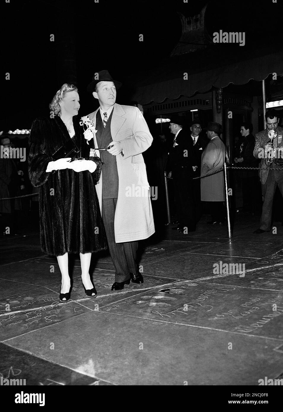 Bing Crosby is shown with his wife Dixie Lee attending the Academy of Motion Picture Arts and ...