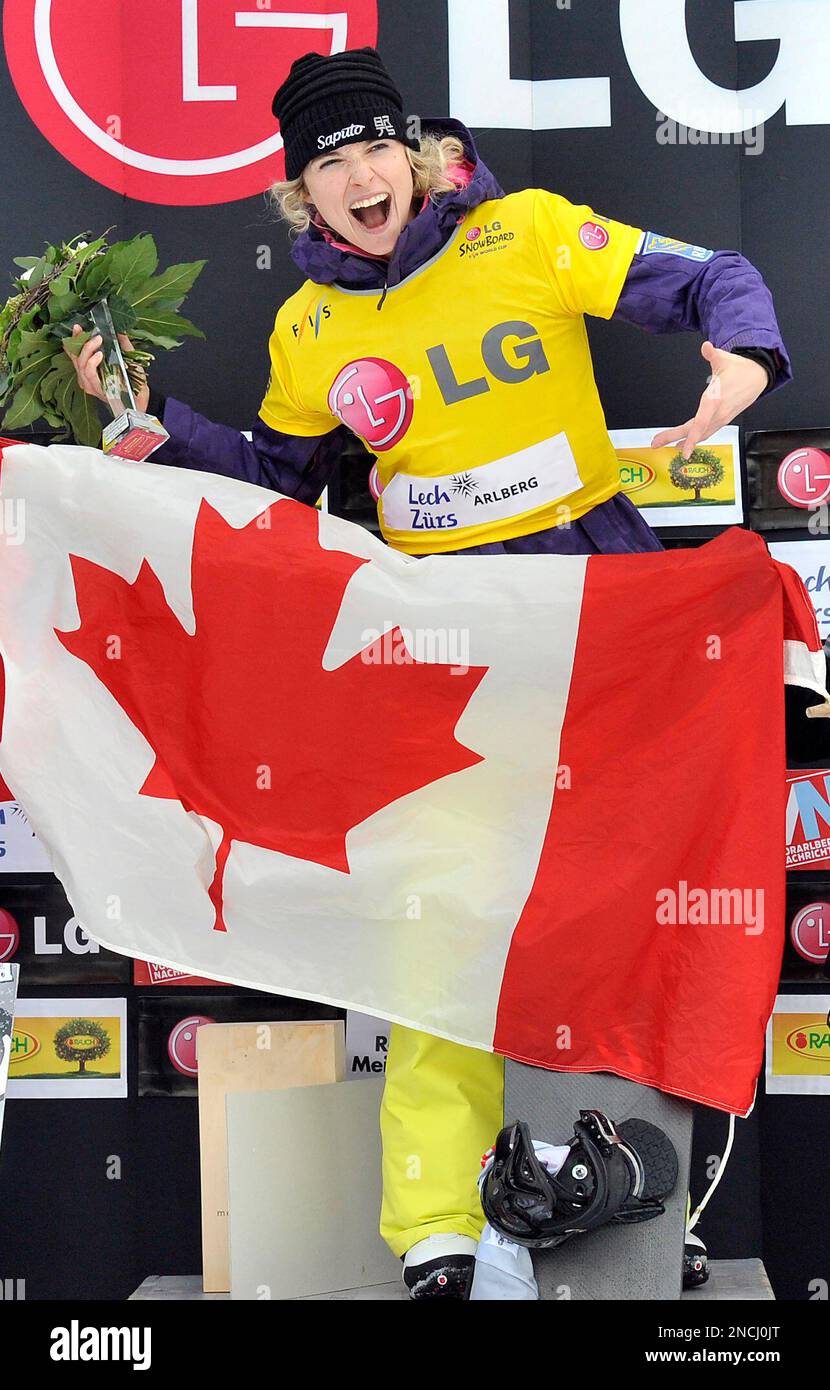 Winner Dominique Maltais from Canada celebrates her victory on the ...