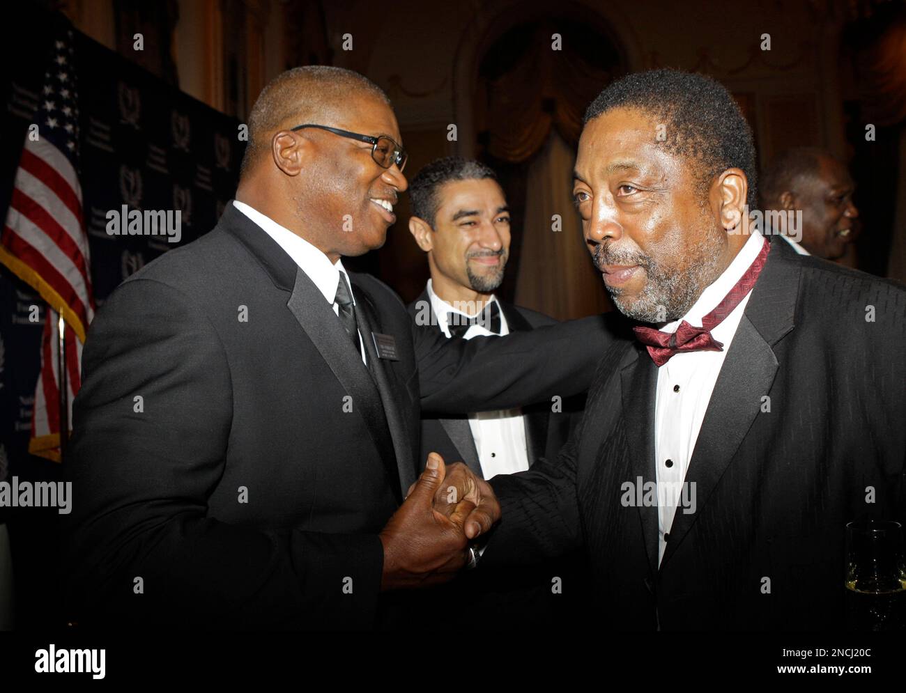 College Football Hall of Fame inductee Sam Cunningham, left, who played ...