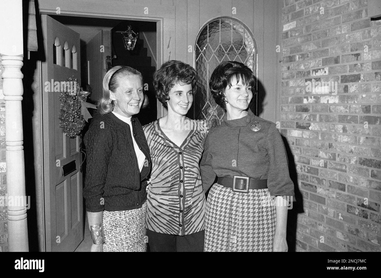 Gathering for a ‘hen party’ while they wait for their husbands to ...