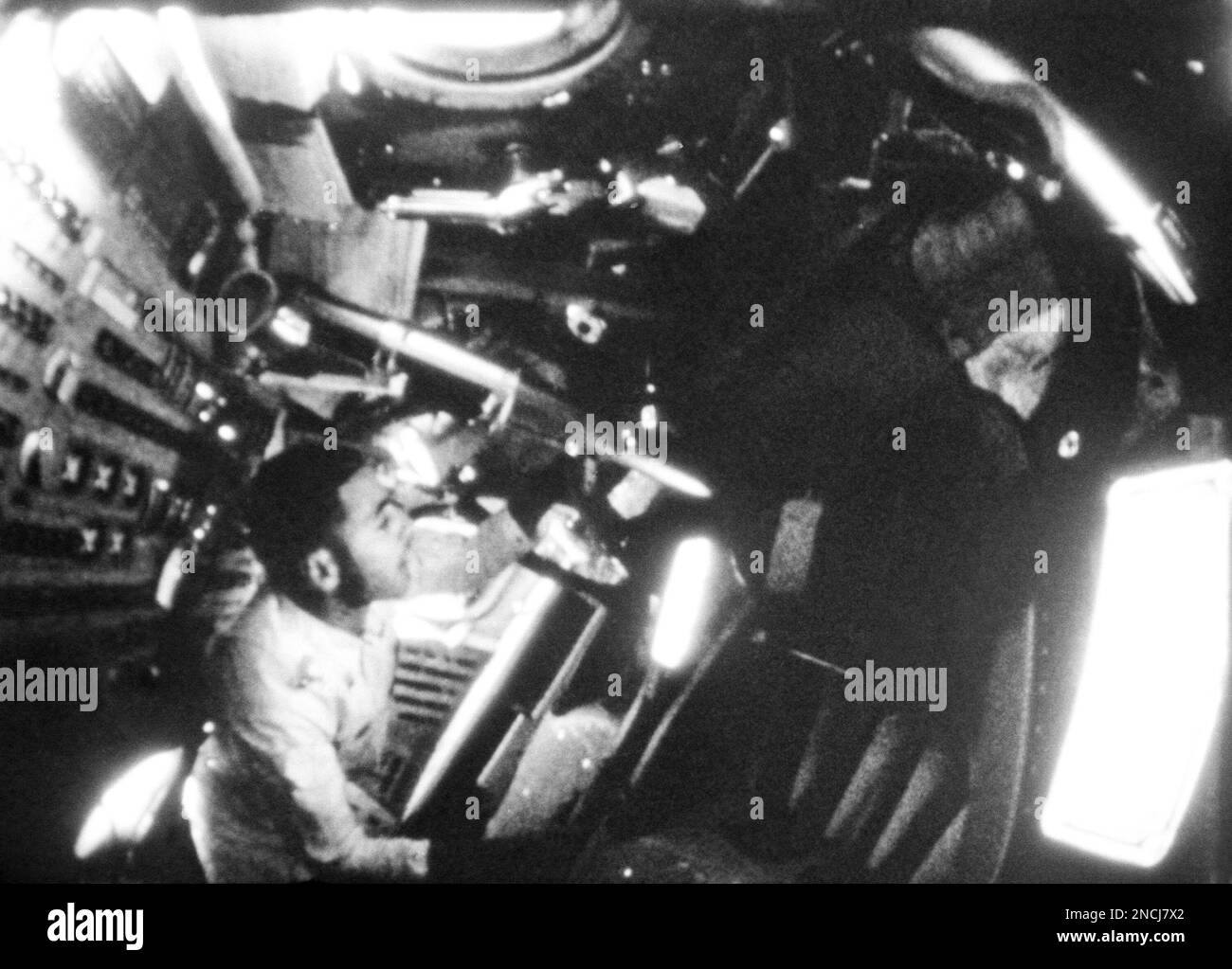 Lt. Col. William A. Anders, Apollo 8 lunar module pilot looks out of ...