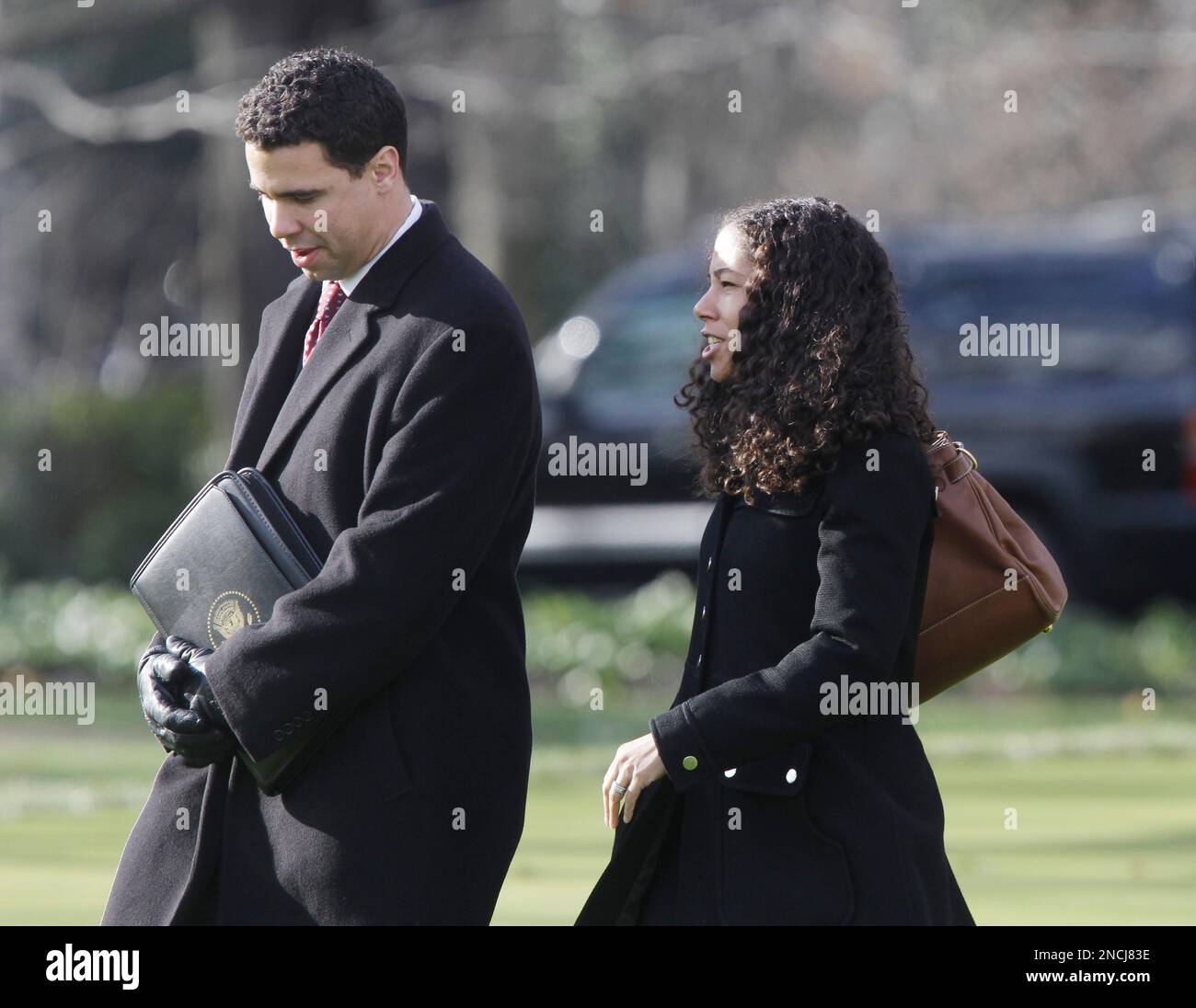 Deputy Chief of Staff Mona Sutphen, right, walks with Deputy Press ...