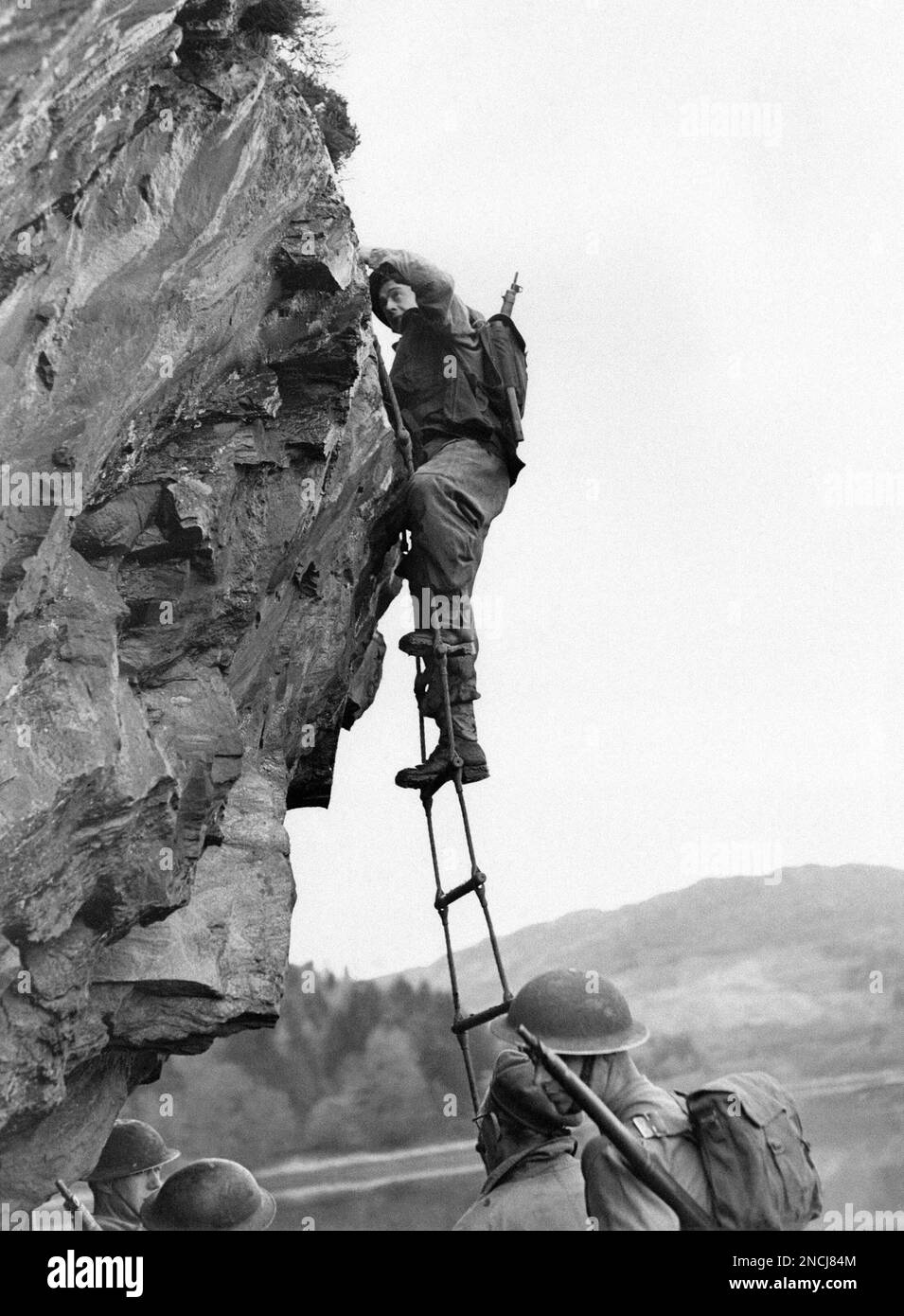The Canadians pursue the enemy, consolidating the beach-head. They are ...