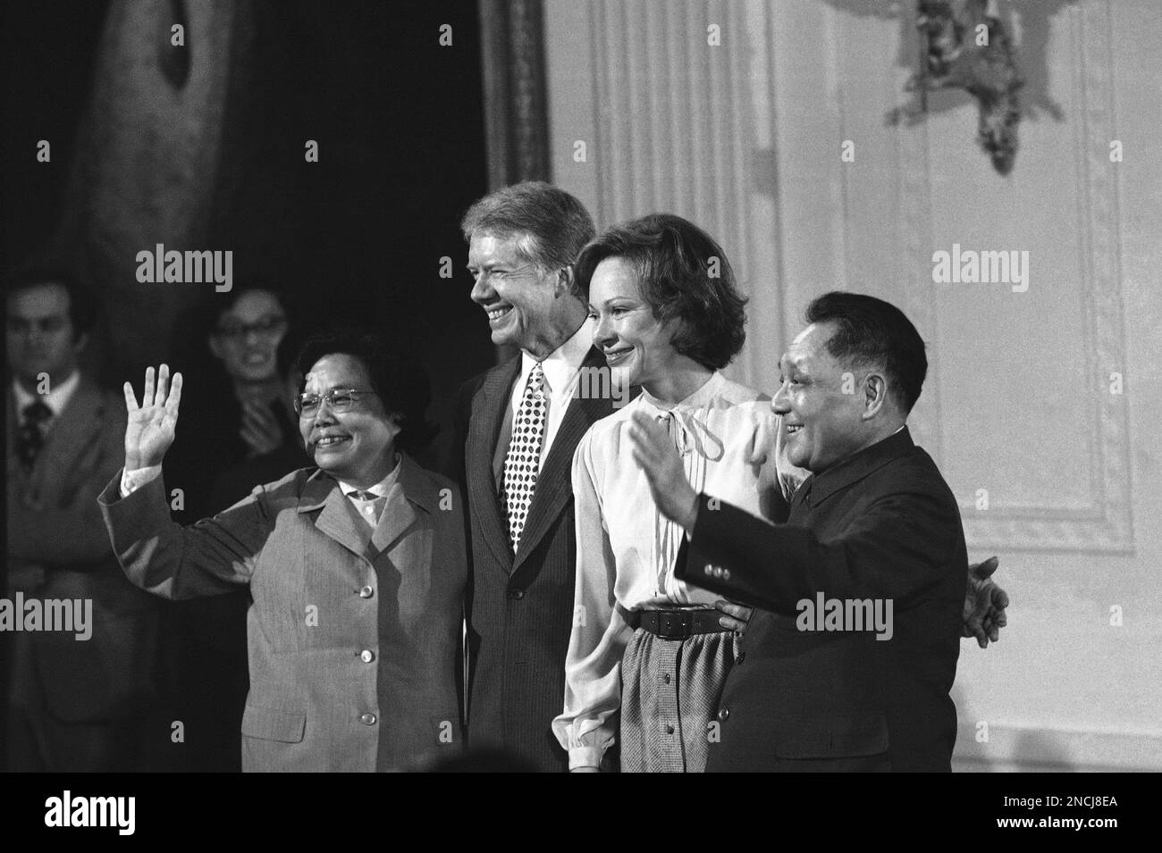President Jimmy Carter and Mrs. Rosalynn Carter stand with Chinese Vice ...