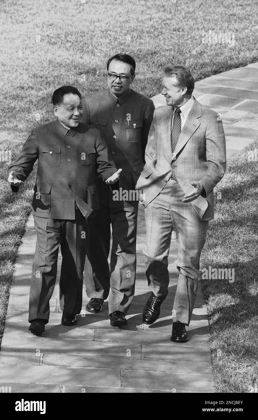 President Jimmy Carter and Chinese Vice Premier Teng Hsiao-ping chat as ...