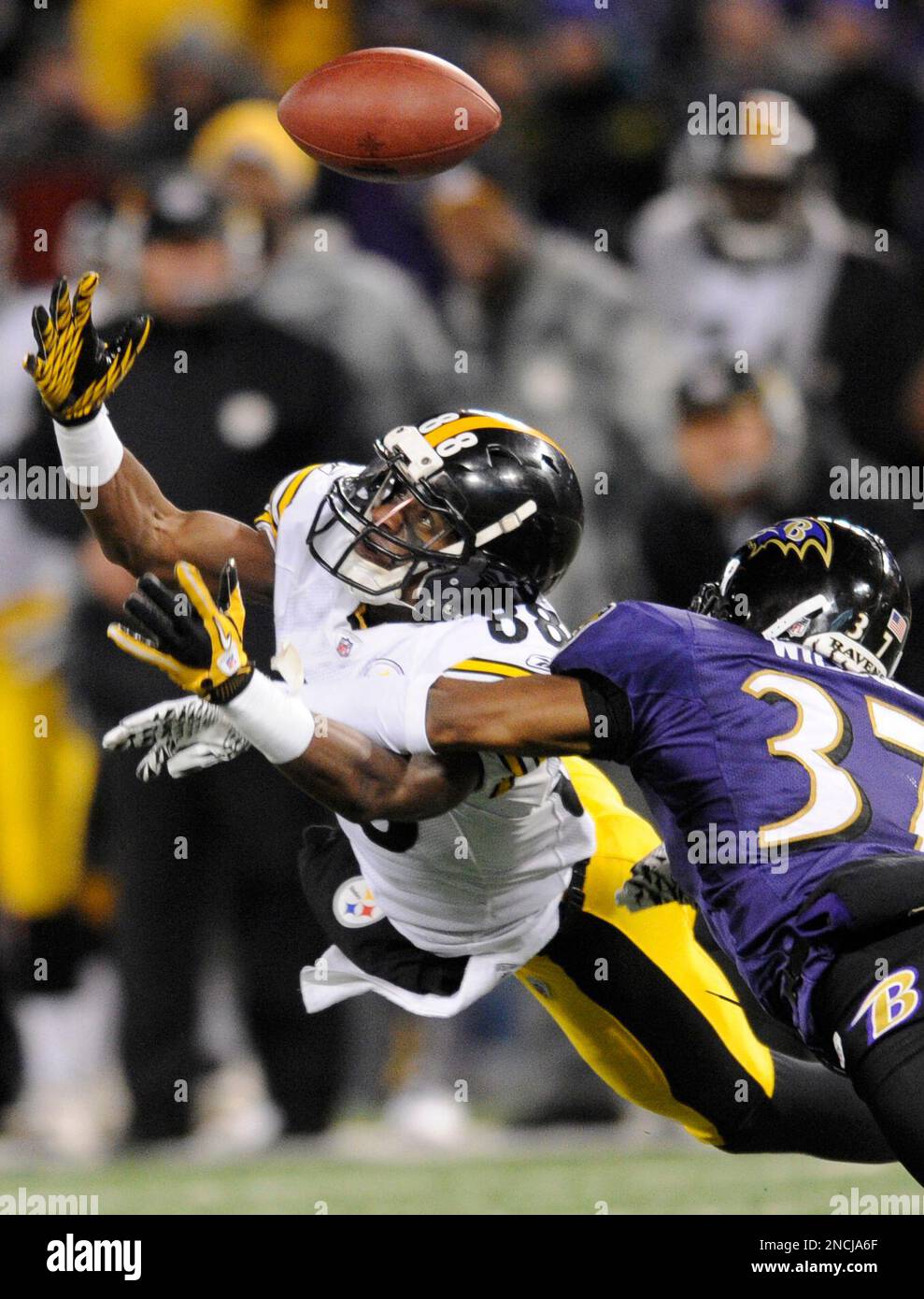 Baltimore Ravens cornerback Josh Wilson (37) breaks up a pass intended ...